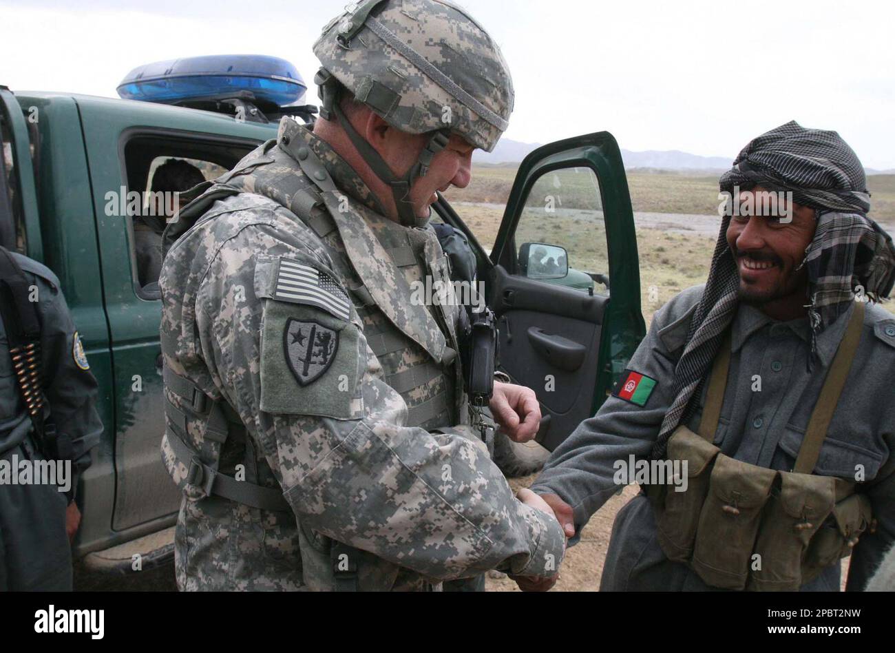 U.S. Maj. Gen. Stephen Layfield, left, deputy commander for Security of ...
