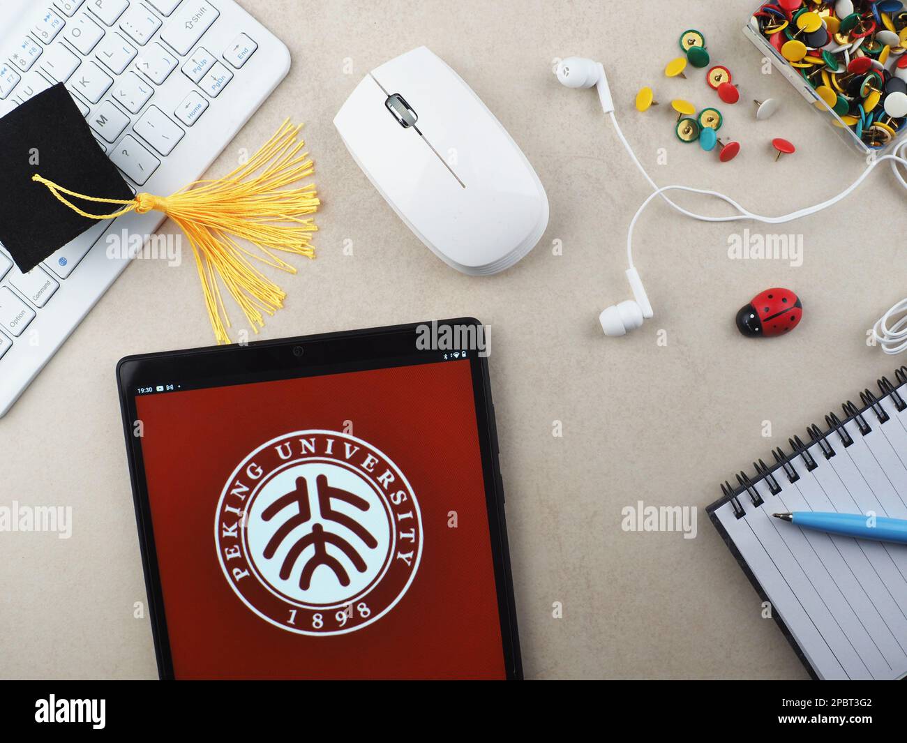 In this photo illustration, Peking University logo seen displayed on a ...