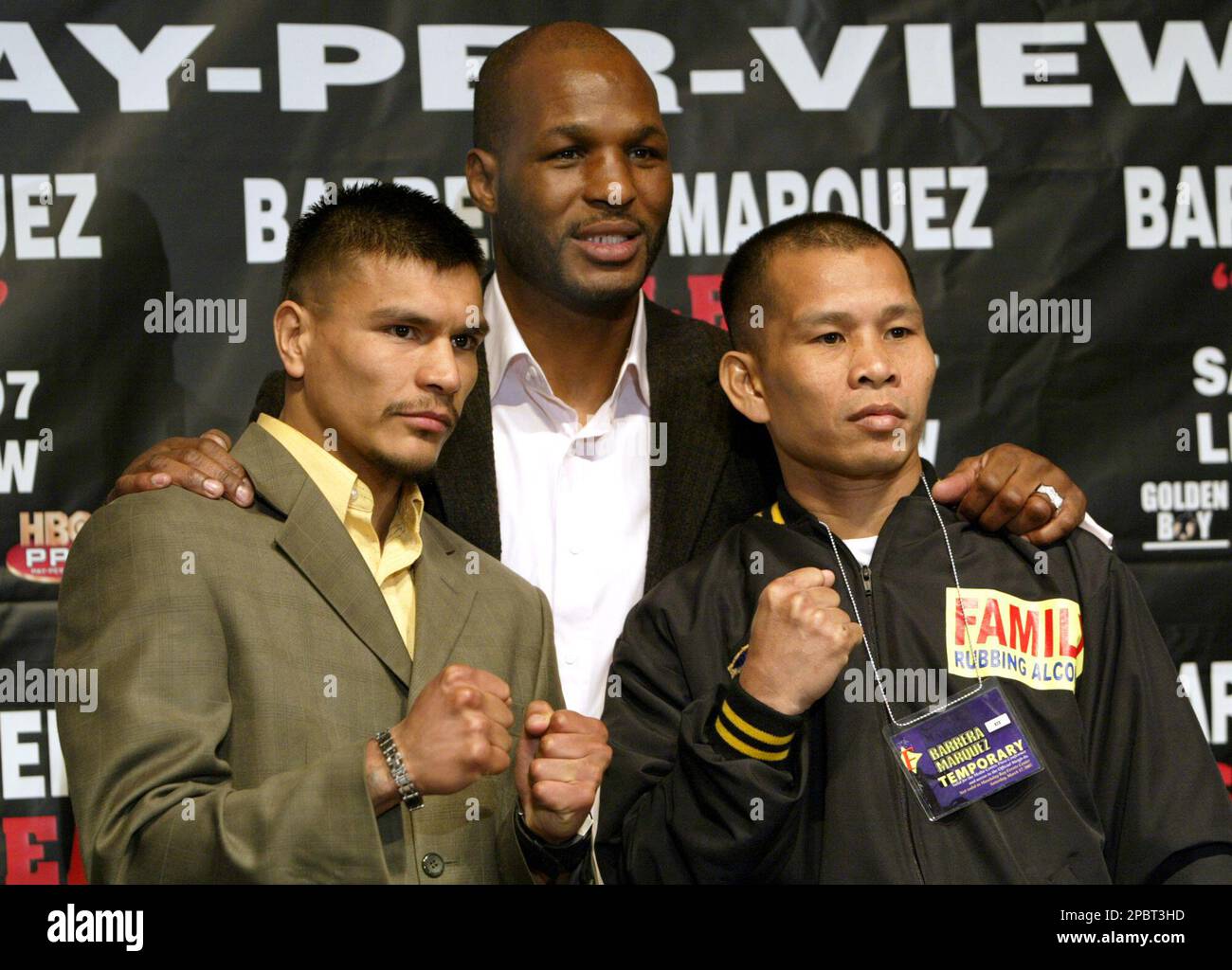 Boxing promoter Bernard Hopkins, center, poses for the media with ...