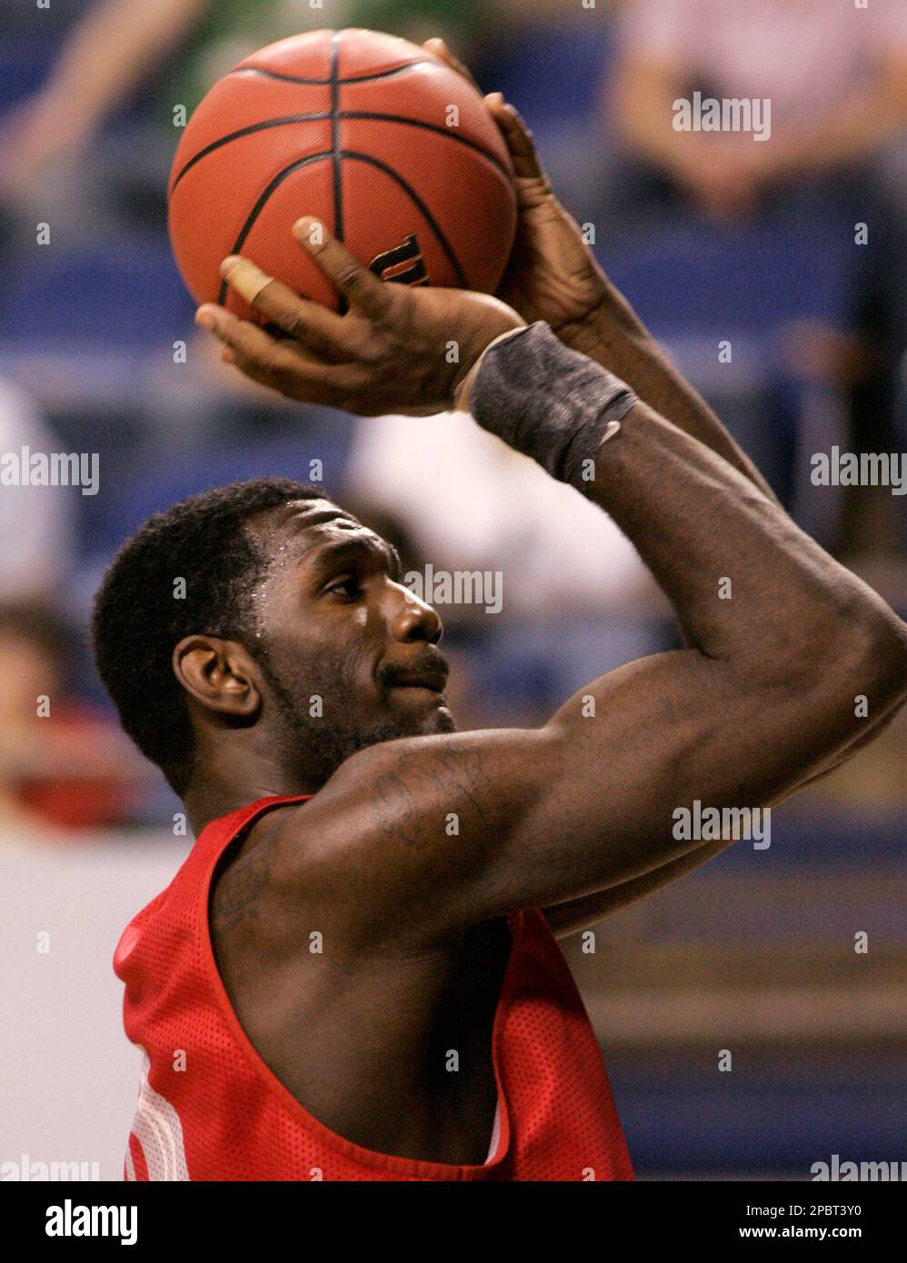 Ohio State center Greg Oden shoots a free throw during team practice in ...