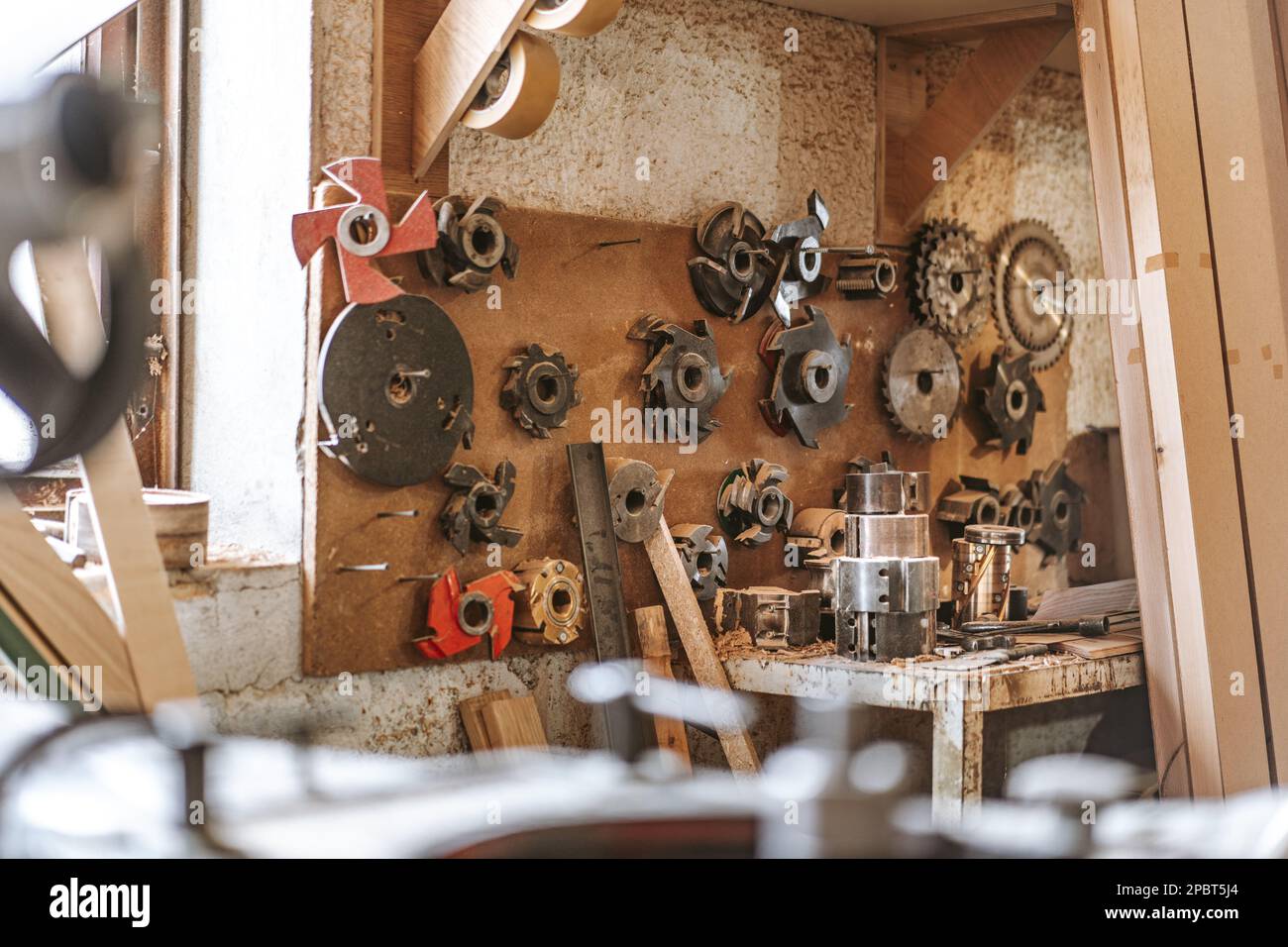 Carpentry shop interior with wood and tools Stock Photo - Alamy