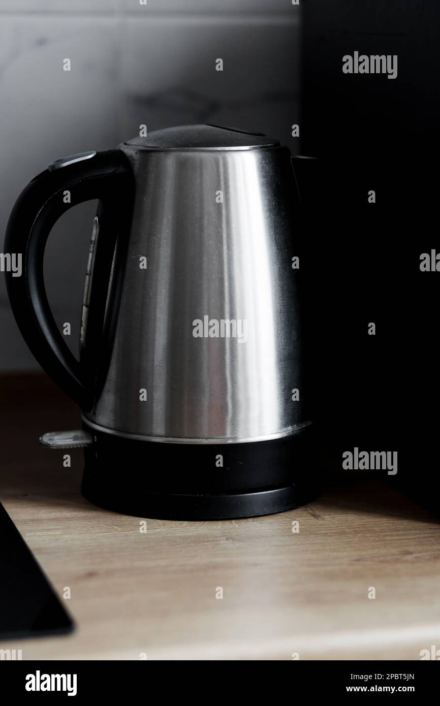 Electric stainless steel kettle on kitchen. household. Nice design of ...