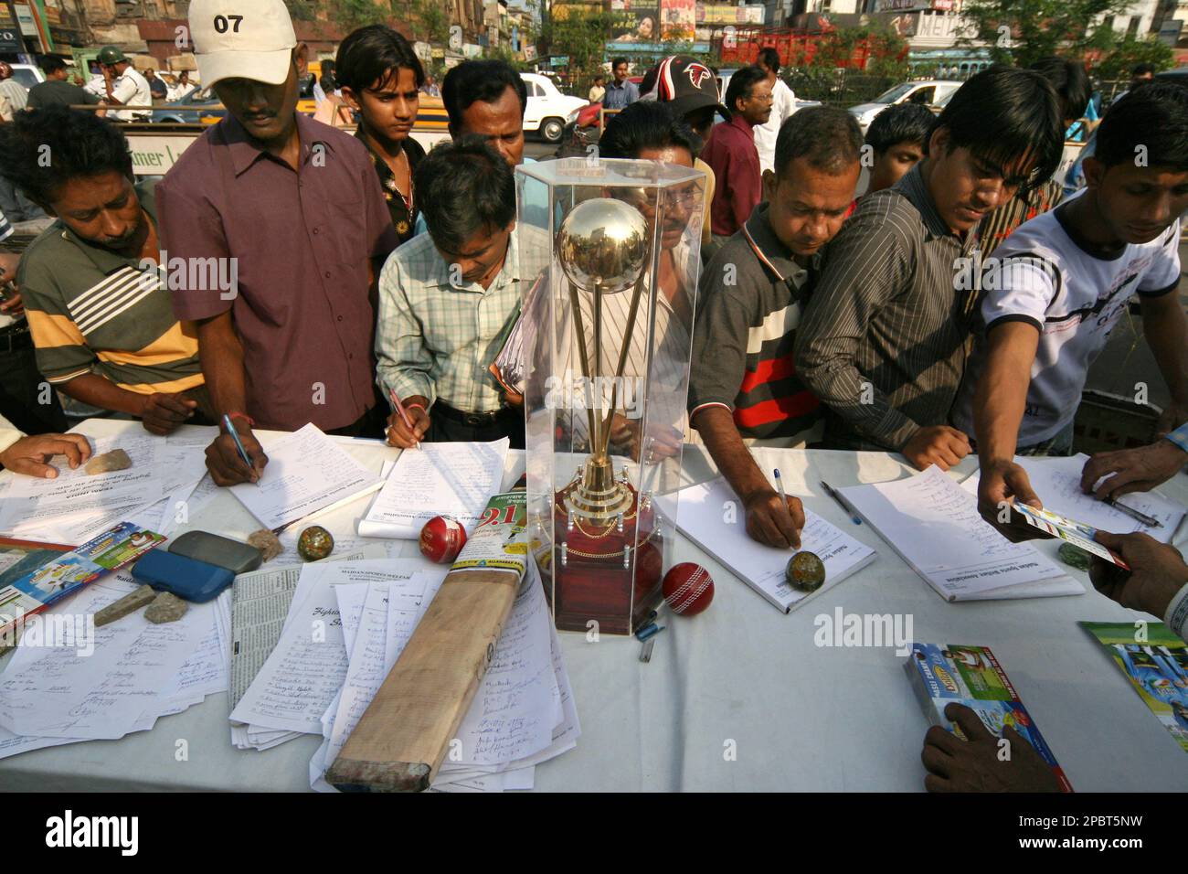 Indian cricket enthusiasts participate in a mass signature campaign to ...