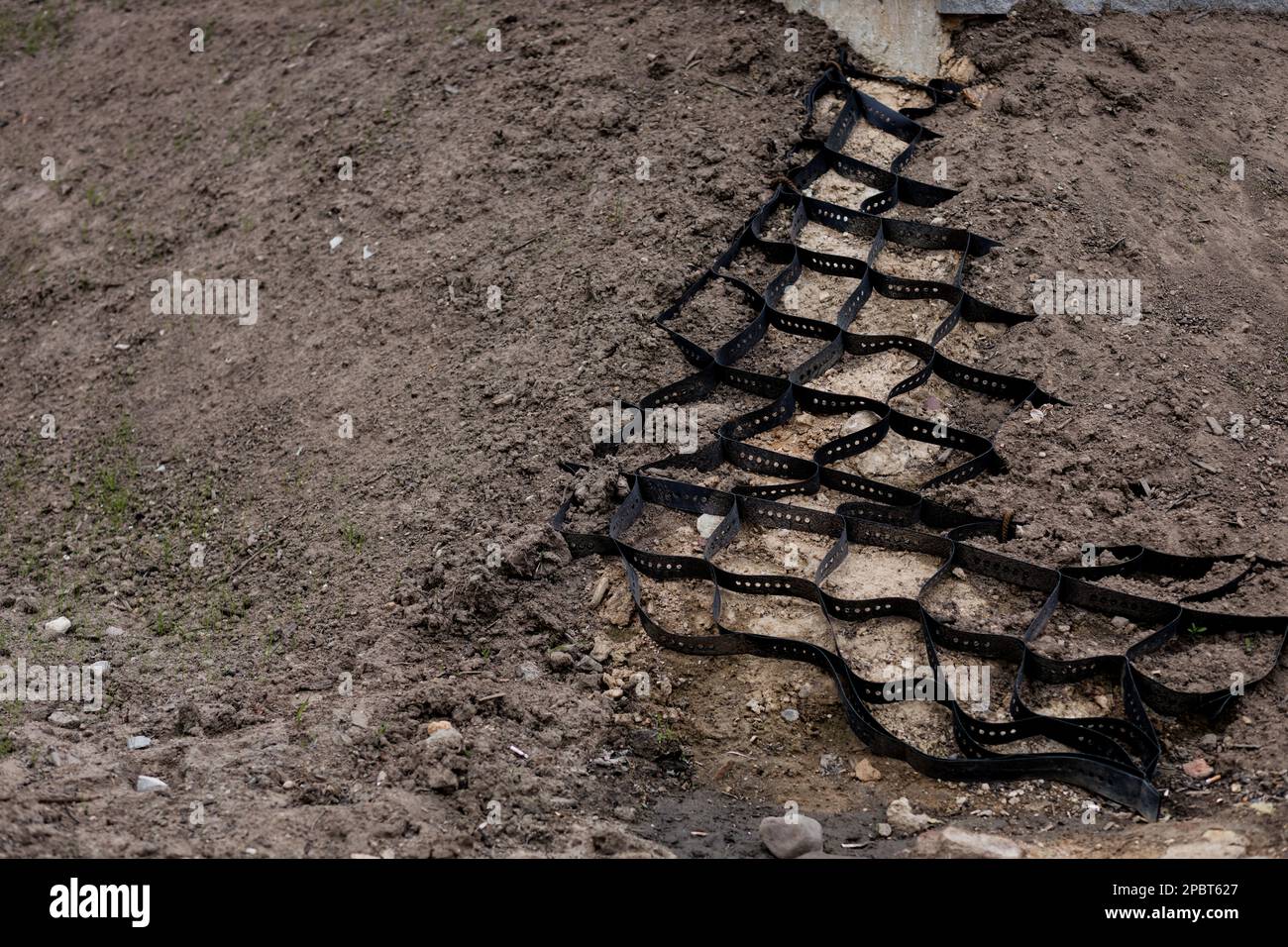 plastic reinforcement. Polymer geogrid Stock Photo - Alamy