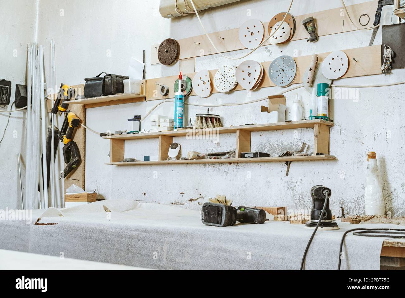 Carpentry shop interior with wood and tools Stock Photo - Alamy