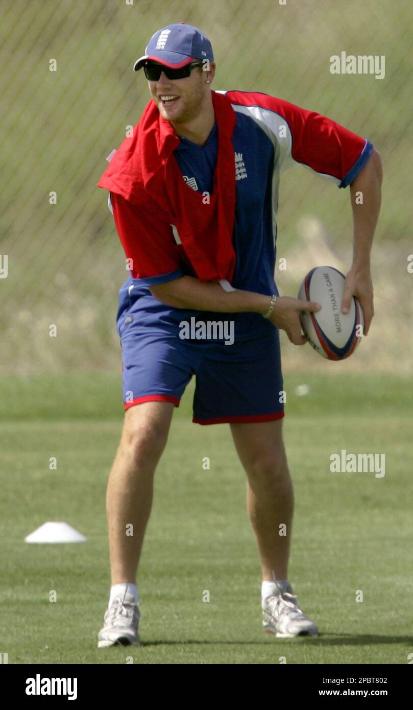 England's Andrew Flintoff throws a rugby ball during a training session ...