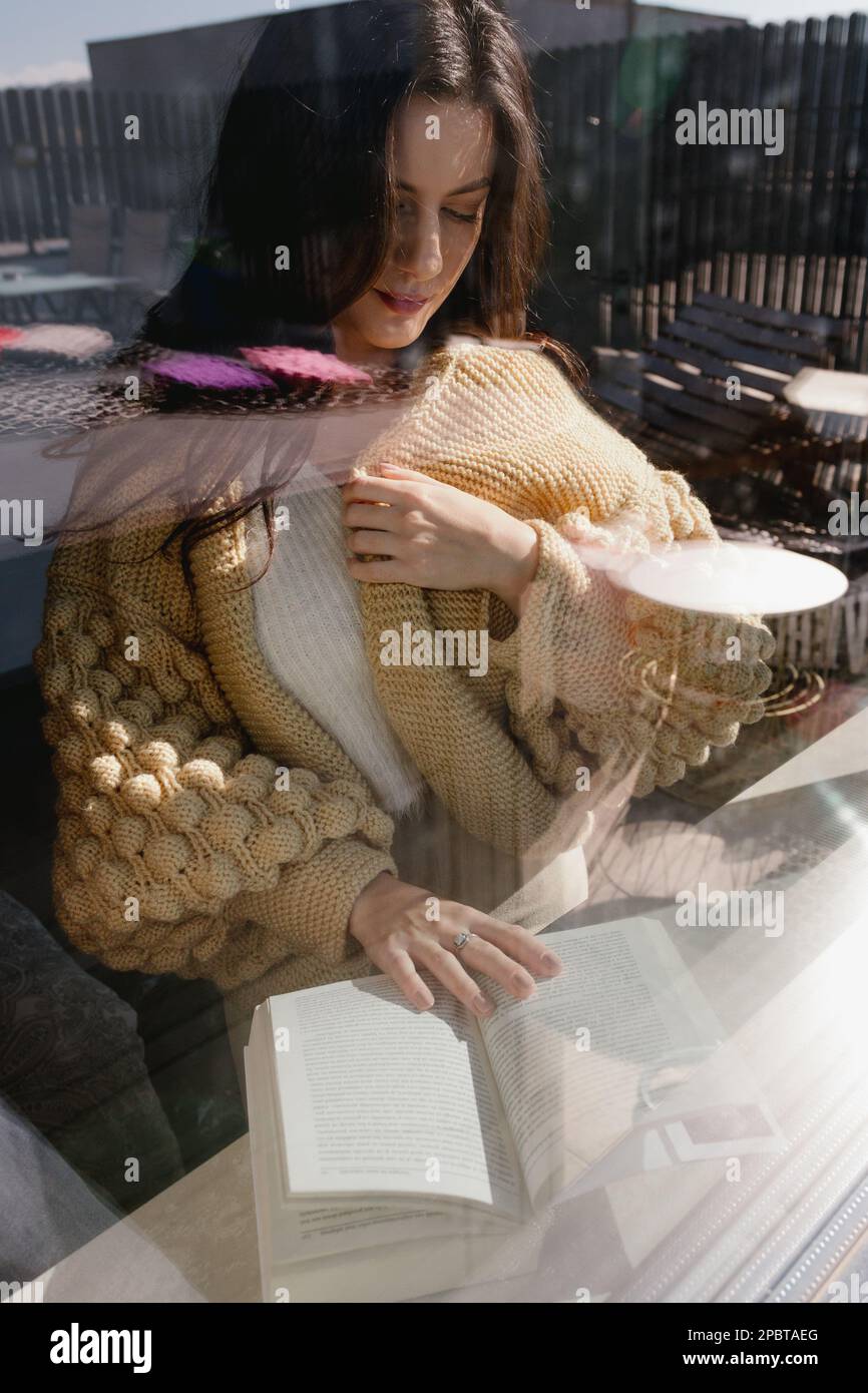 Cute girl wearing some knitted clothing Stock Photo - Alamy