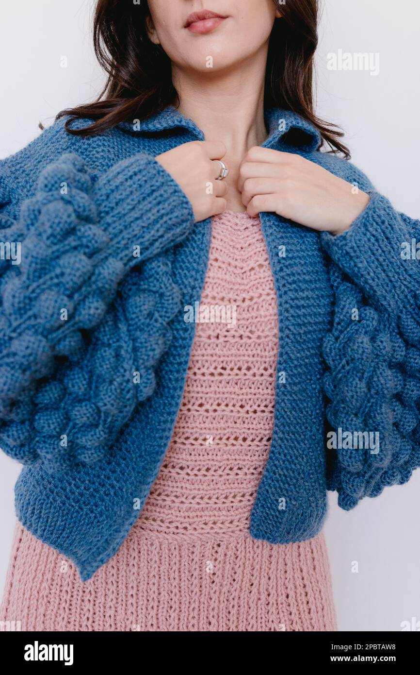 Cute girl wearing some knitted clothing Stock Photo - Alamy