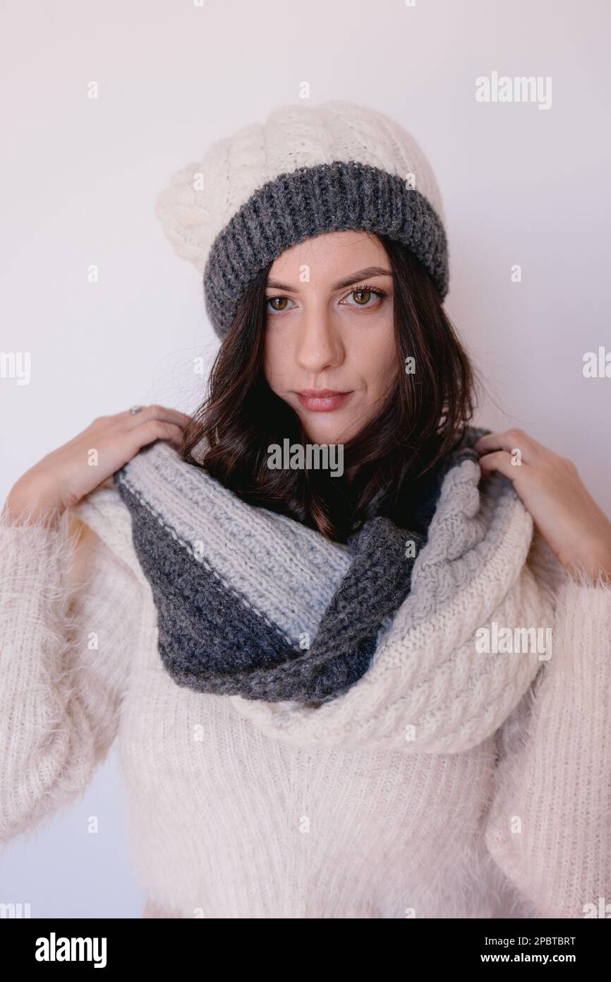 Cute girl wearing some knitted clothing Stock Photo - Alamy