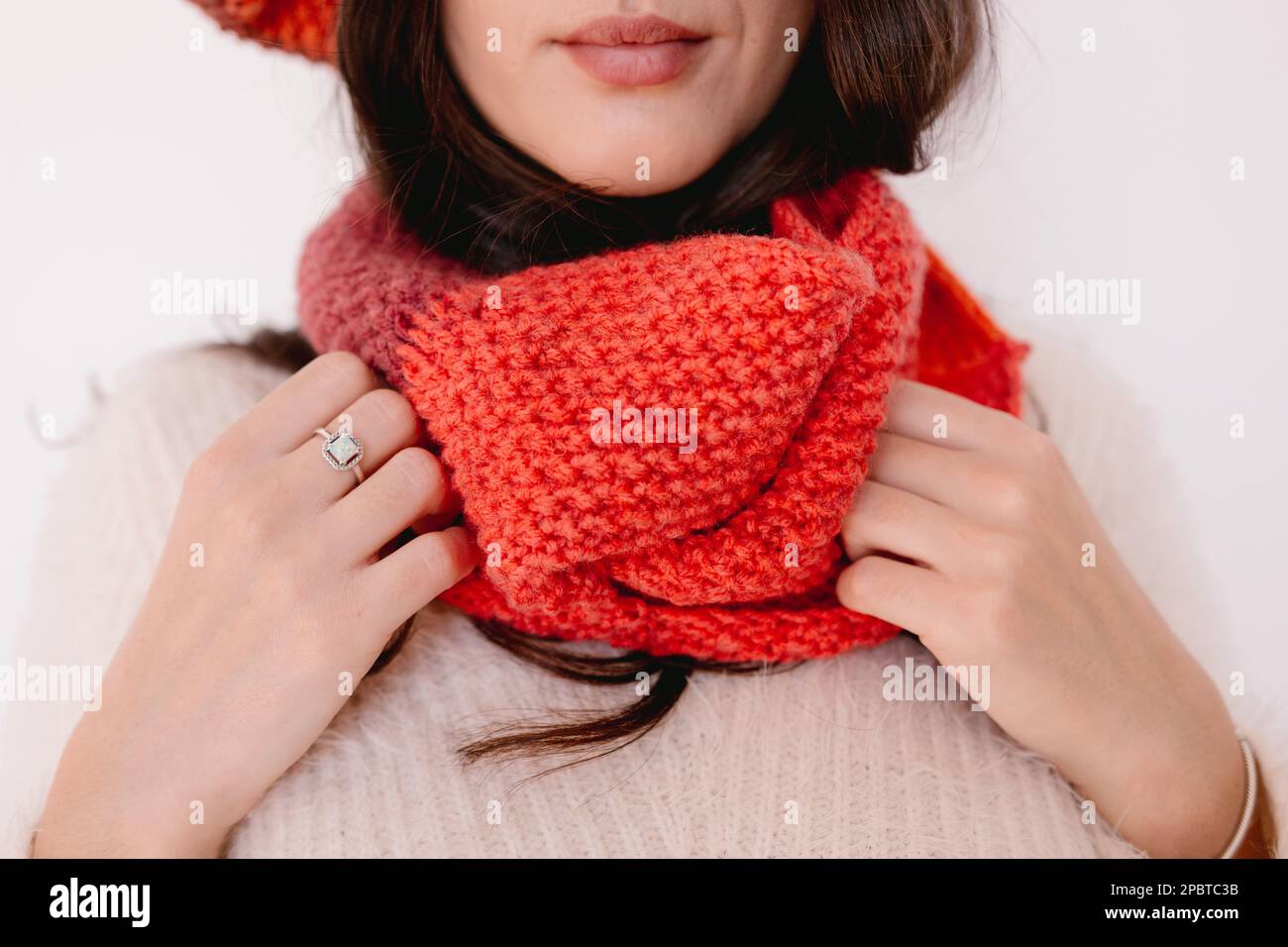 Cute girl wearing some knitted clothing Stock Photo - Alamy
