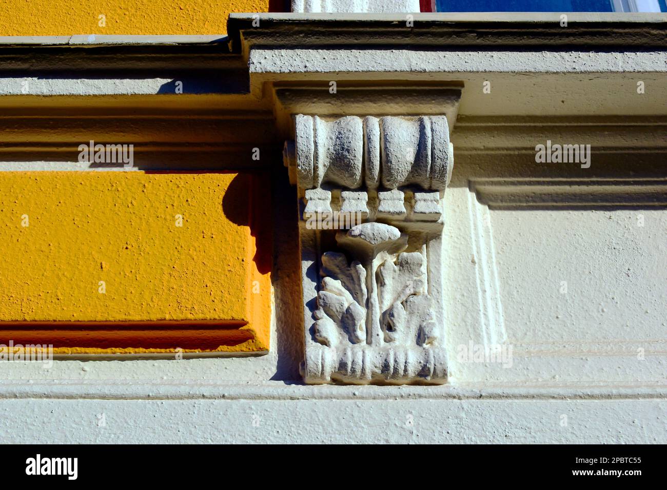 stippled yellow stucco exterior elevation detail with rough texture ...
