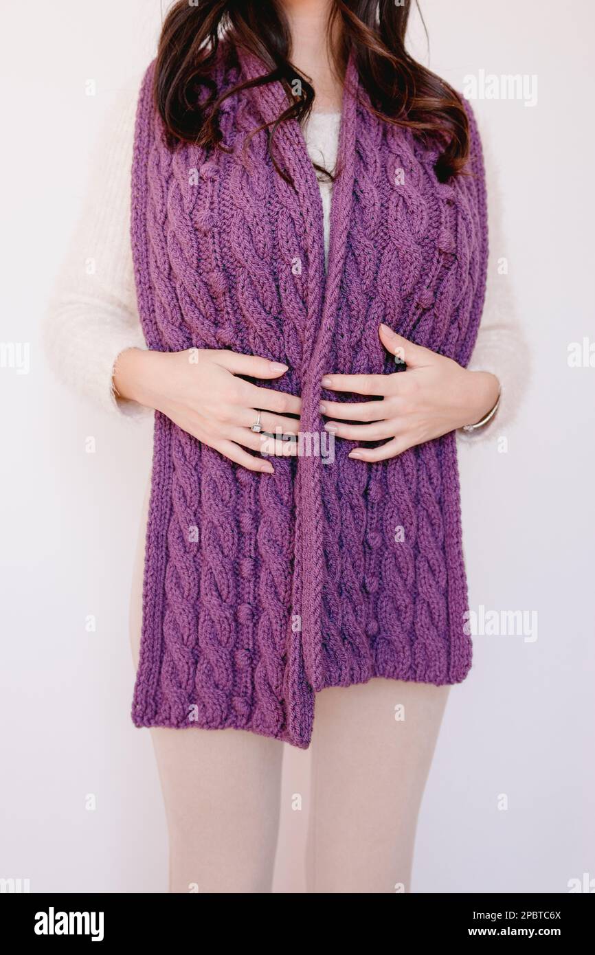 Cute girl wearing some knitted clothing Stock Photo - Alamy