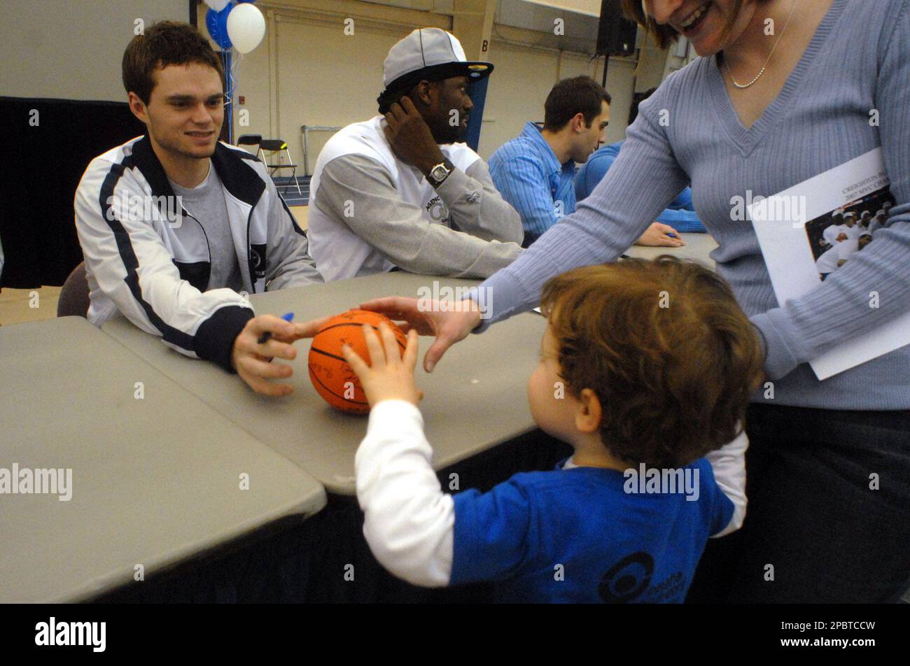 Creighton's Nate Funk signs an autograph for Paul McGill Sunday, March ...