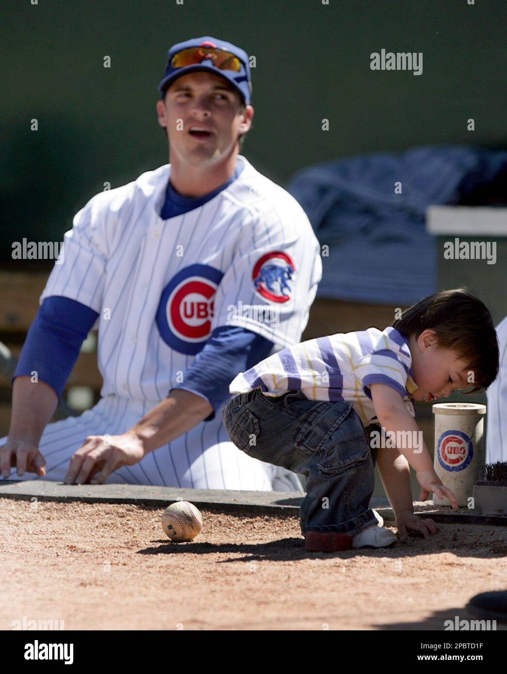 Houston Theriot, right, the 22-month-old son of Chicago Cubs second ...