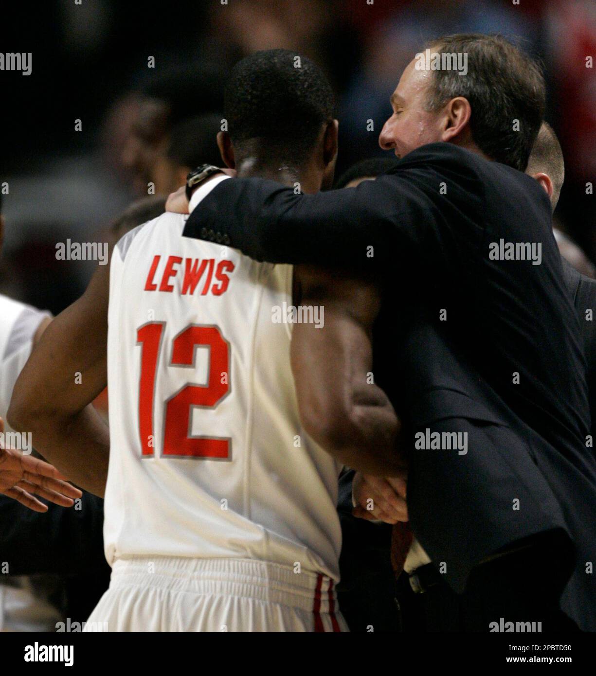 Ohio State coach Thad Matta, right, hugs Ohio State guard Ron Lewis ...