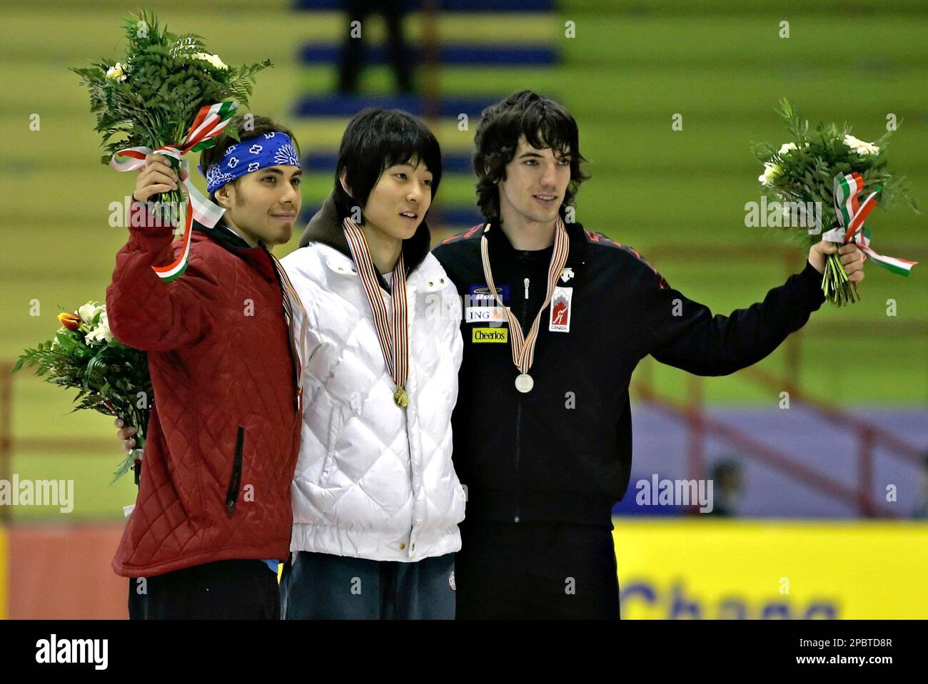 From left, Apolo Anton Ohno, bronze medal, of the United States, Korea ...