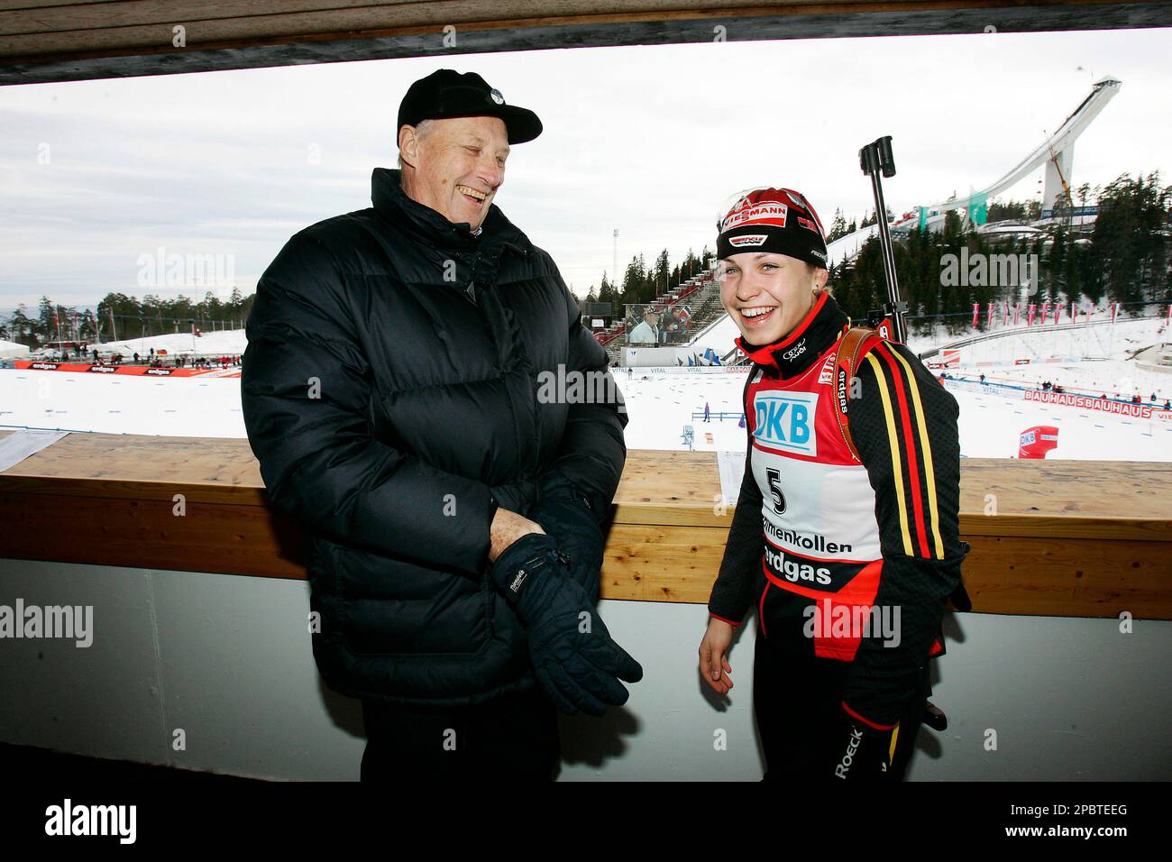 Magdalena Neuner, of Germany, talks with Norway's King Harald after she ...