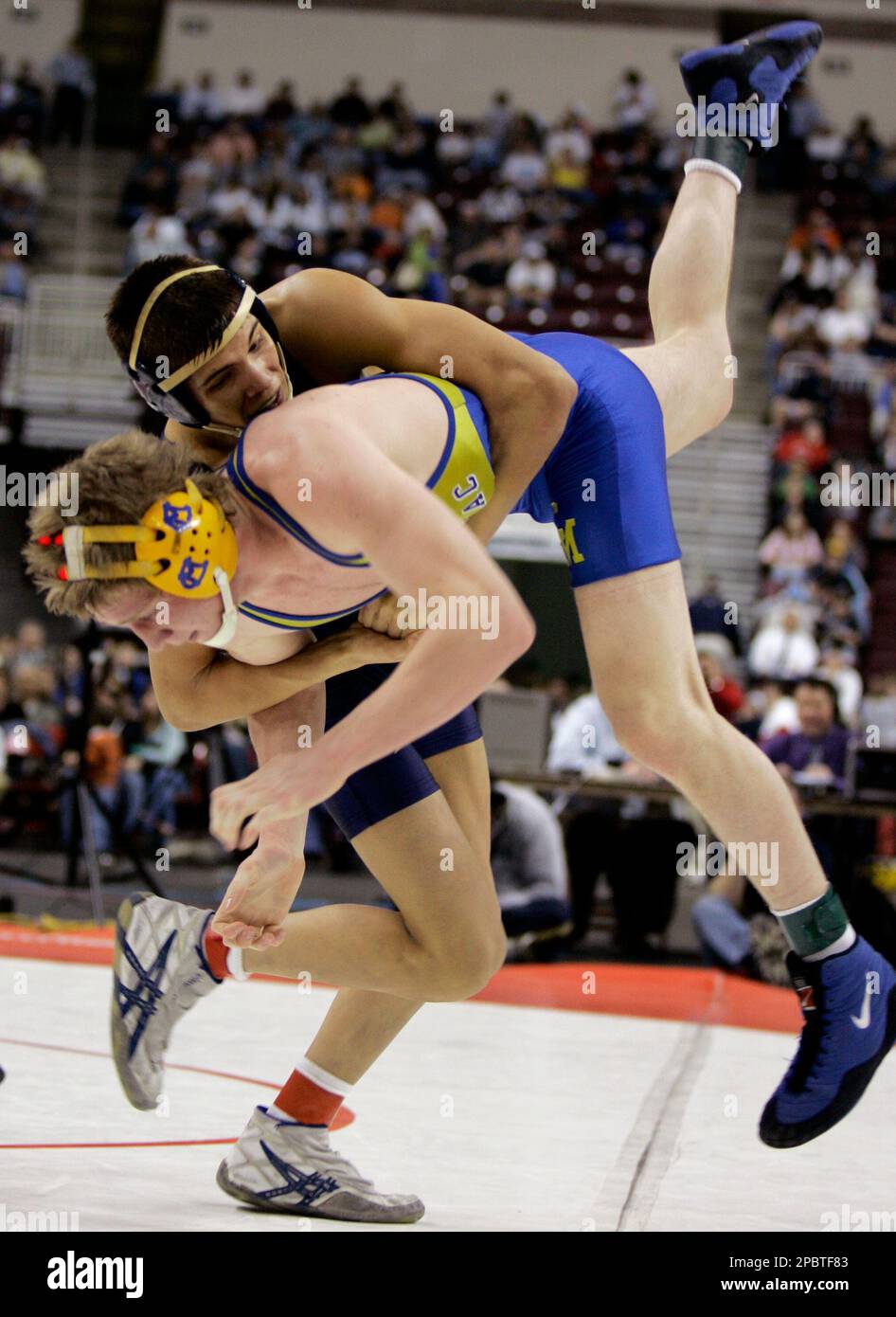 Bald Eagle Area's Quentin Wright, left, takes down Canon-McMillan's Matt Ryan during their 160 ...