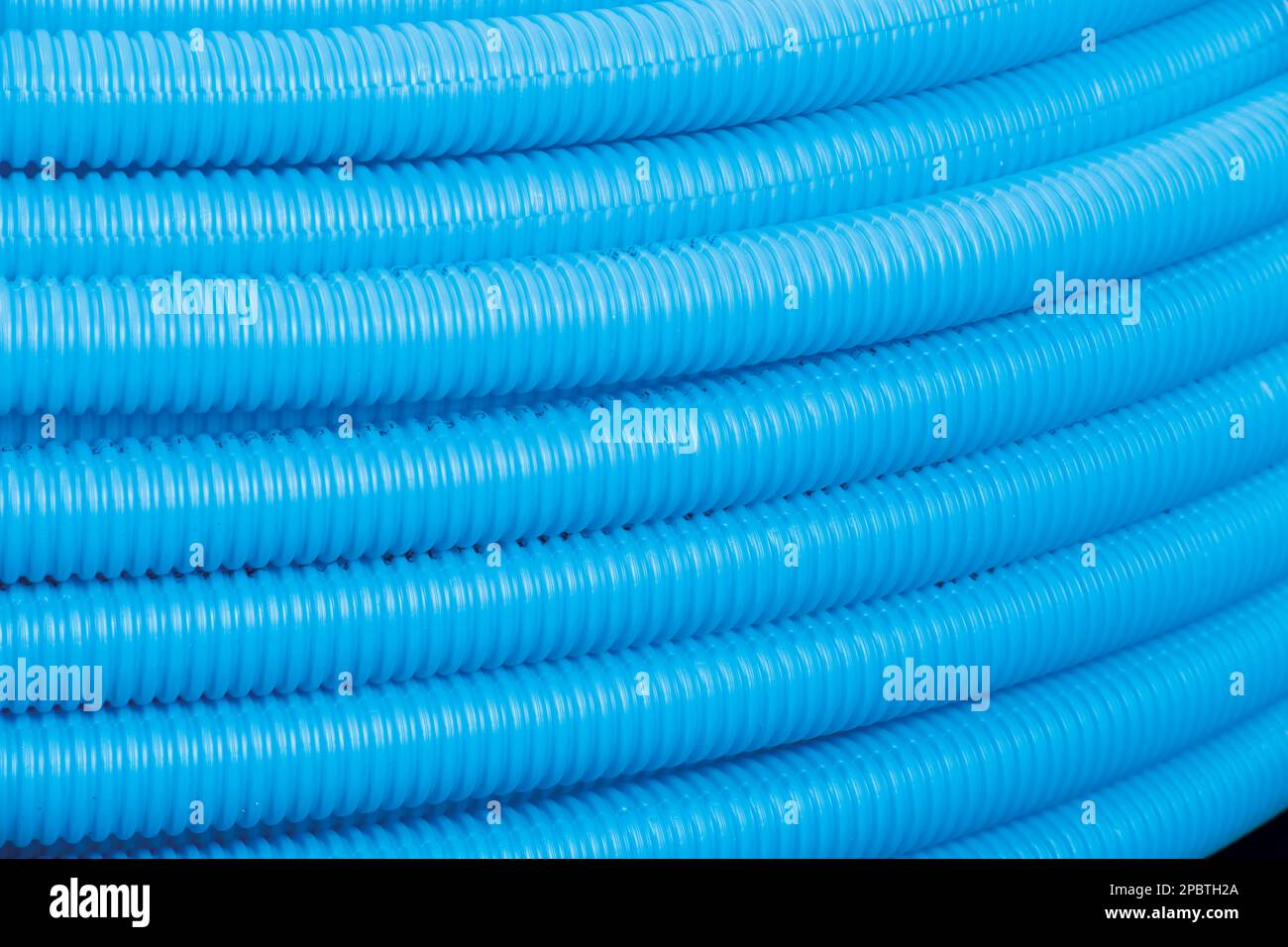 Bunches of PVC pipe sitting on palets at a wholesale pipe store Stock ...