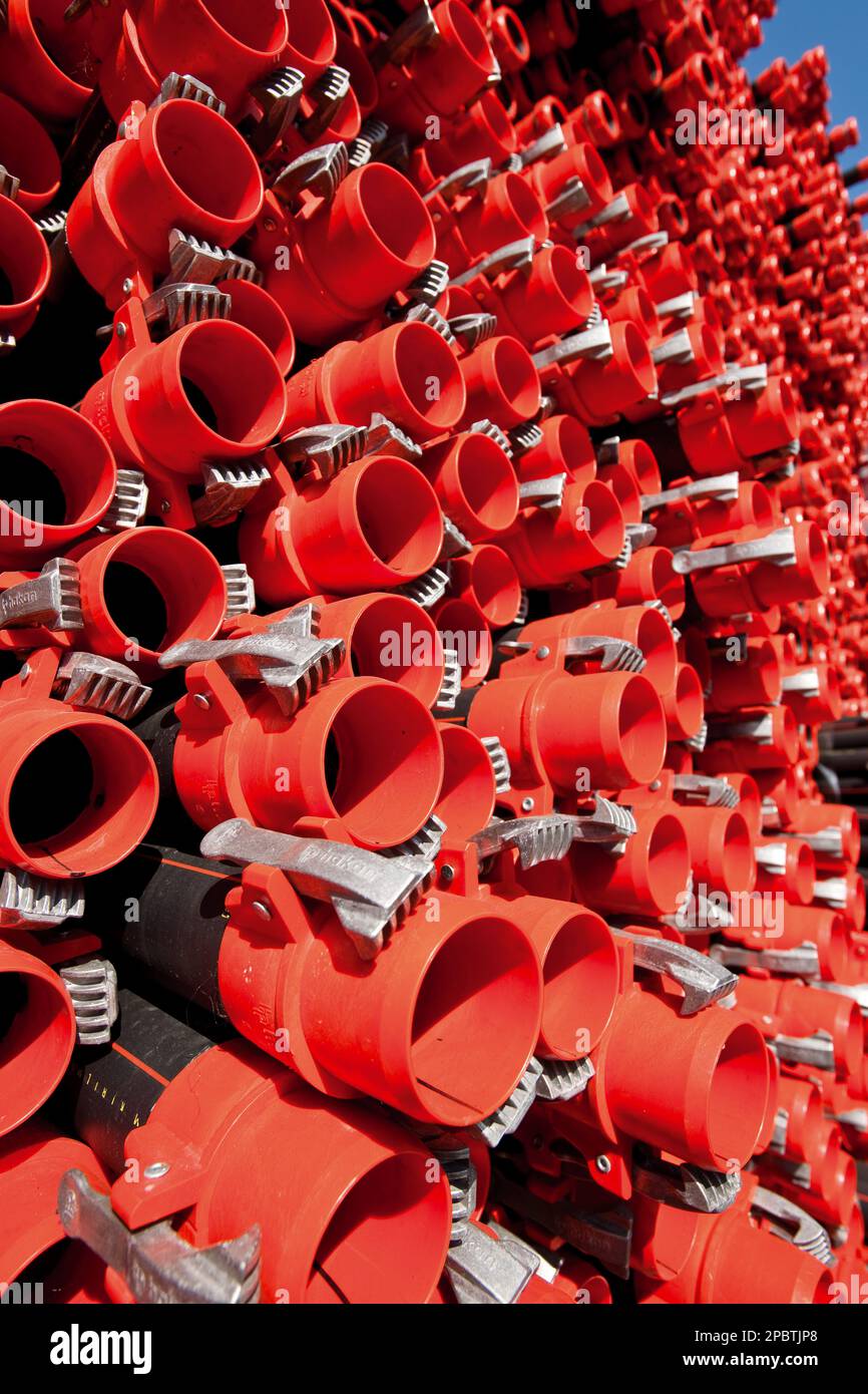 Bunches of PVC pipe sitting on palets at a wholesale pipe store Stock ...