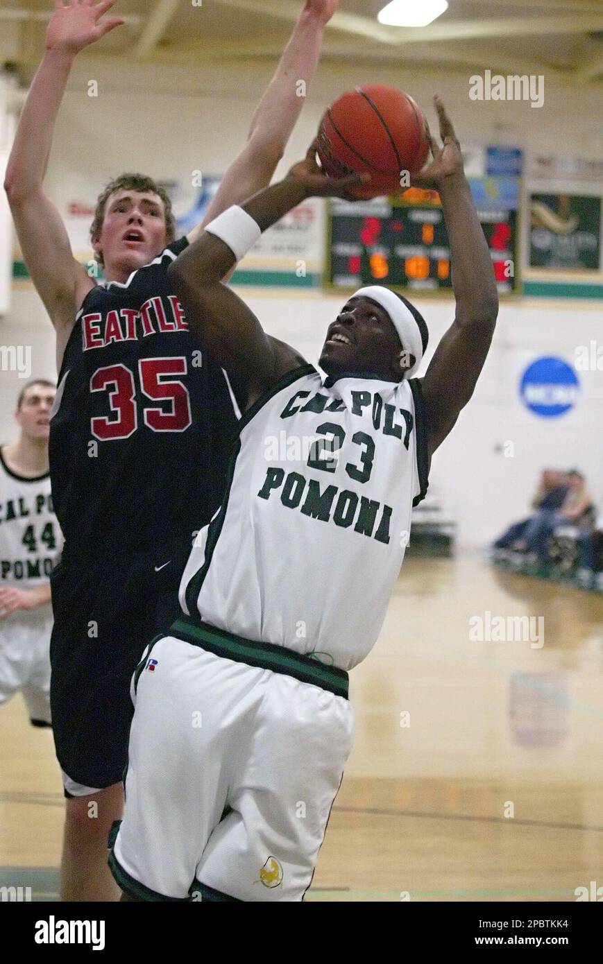 Cal Poly Pomona's Larry Gordon (23) goes up for a shot in front of ...