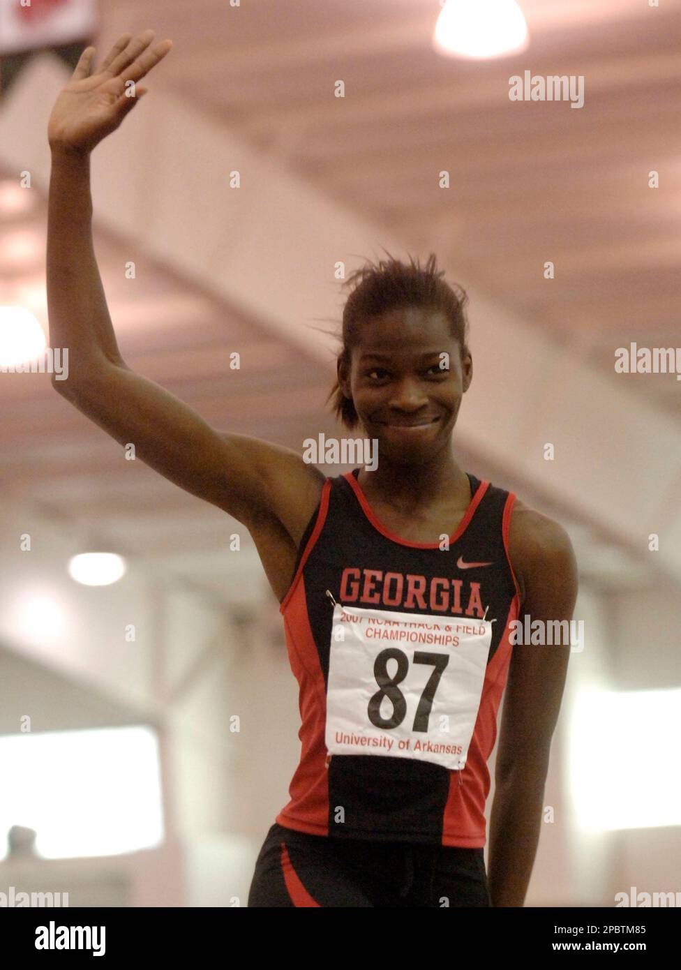 Georgia's Patty Sylvester waves to the crowd after completing a jump ...