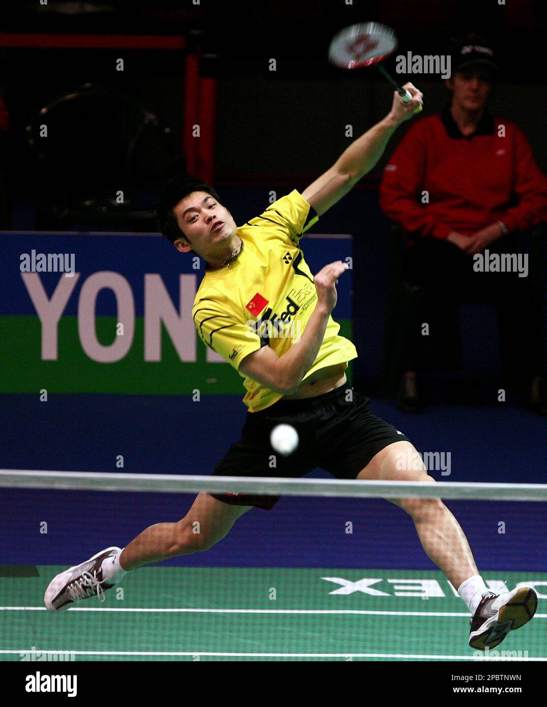 China's Lin Dan, hits a shot during his quarter-final match against ...