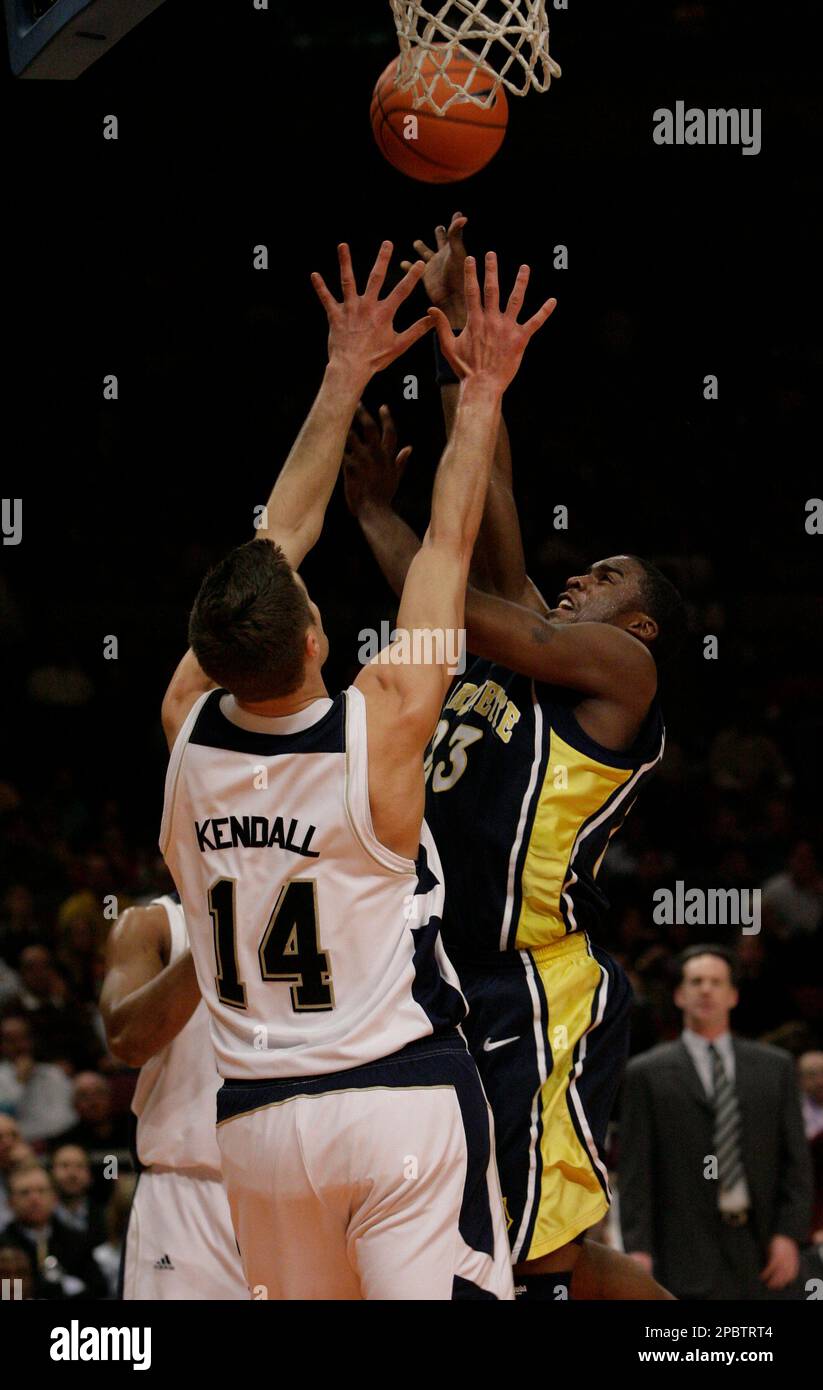 Marquette's Wesley Matthews (23) goes up to the basket against ...
