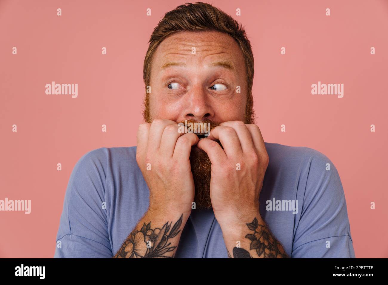 Ginger Scared Man With Beard Expressing Surprise At Camera Isolated