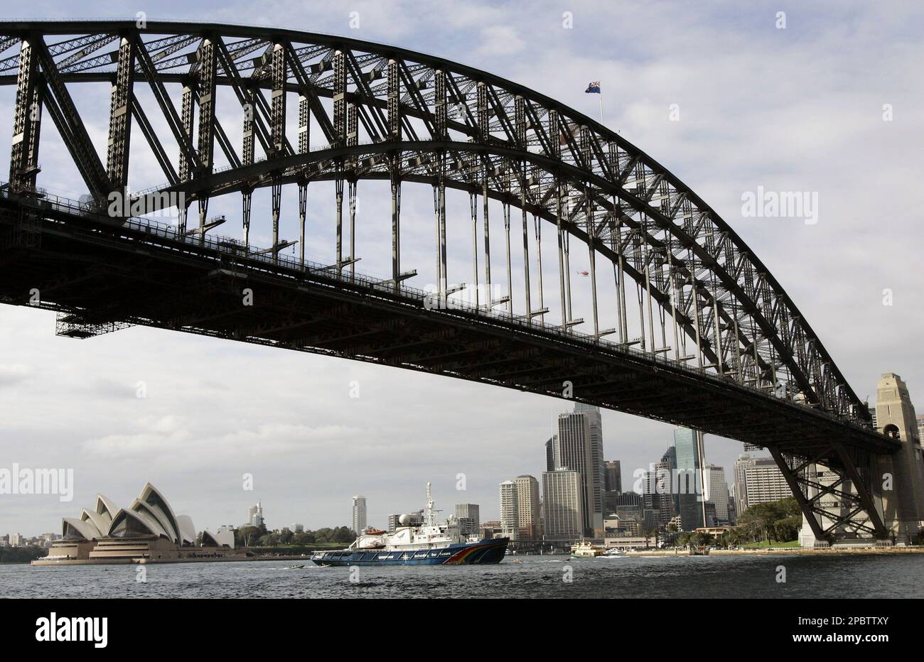 Greenpeace ship the Esperanza sails past the Sydney Opera House and ...