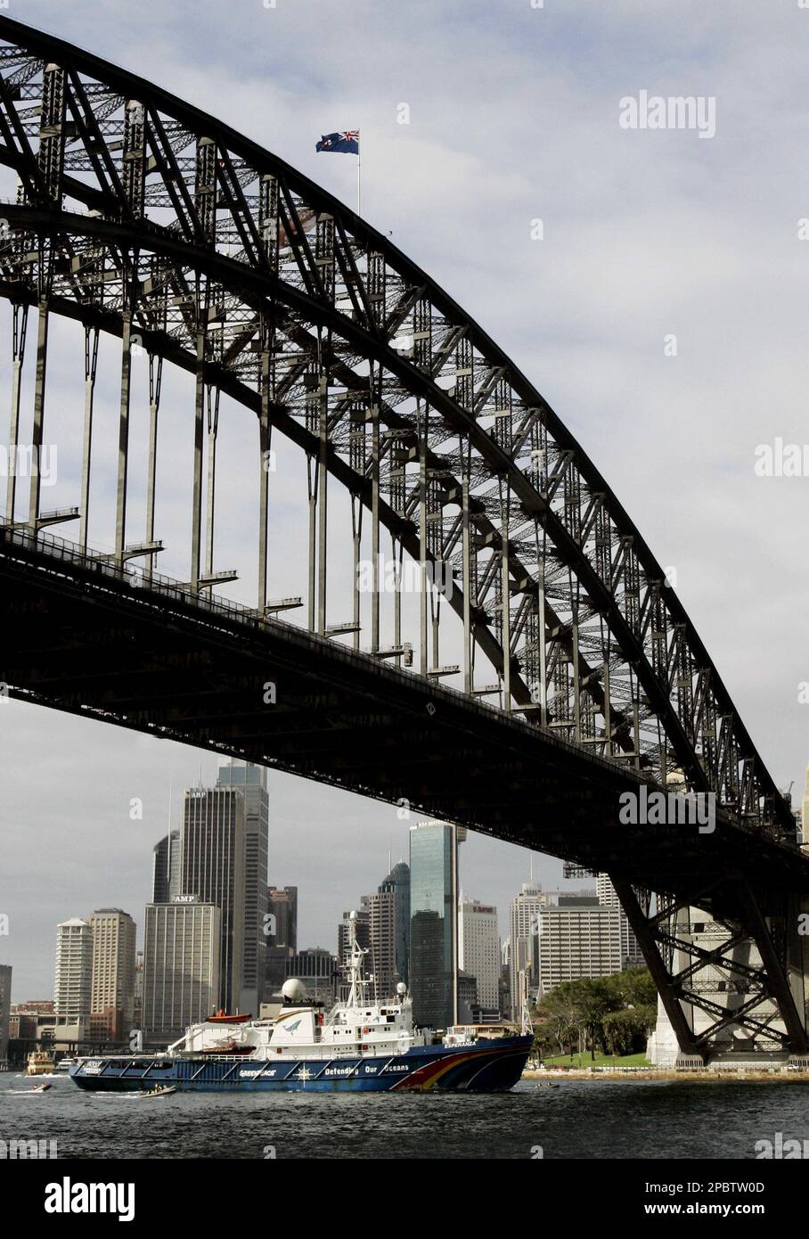 Greenpeace ship the Esperanza sails under the Sydney Harbour Bridge as ...