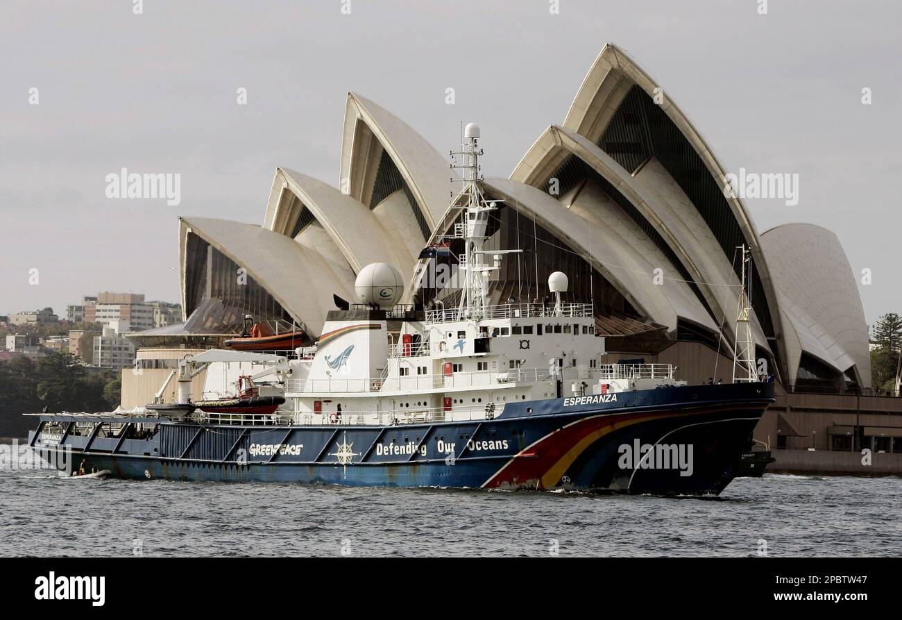 Greenpeace ship the Esperanza sails past the Sydney Opera House as it ...