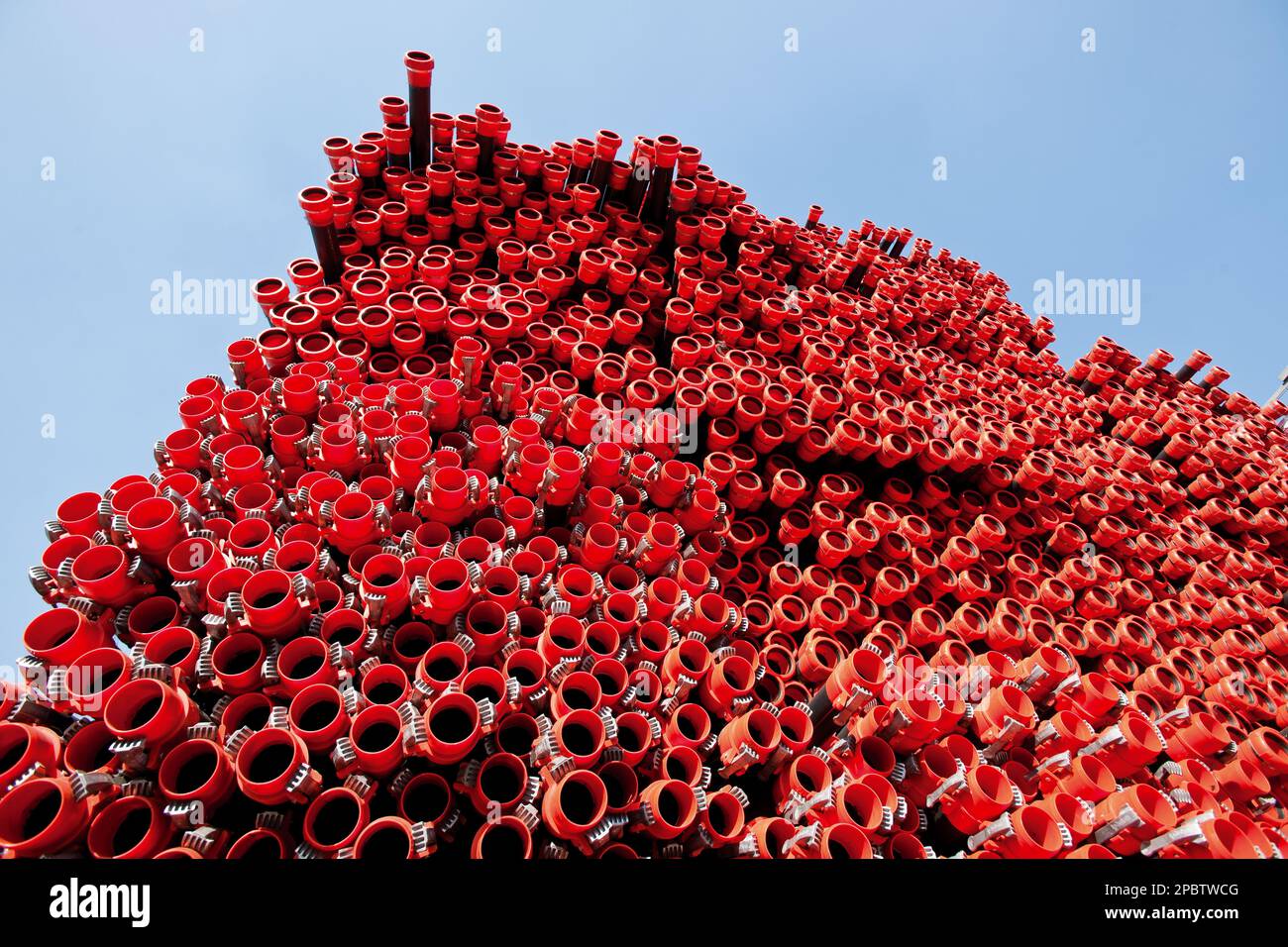 Bunches of PVC pipe sitting on palets at a wholesale pipe store Stock ...