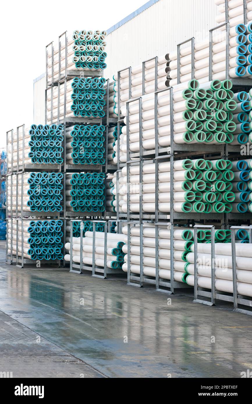 Bunches of PVC pipe sitting on palets at a wholesale pipe store Stock ...