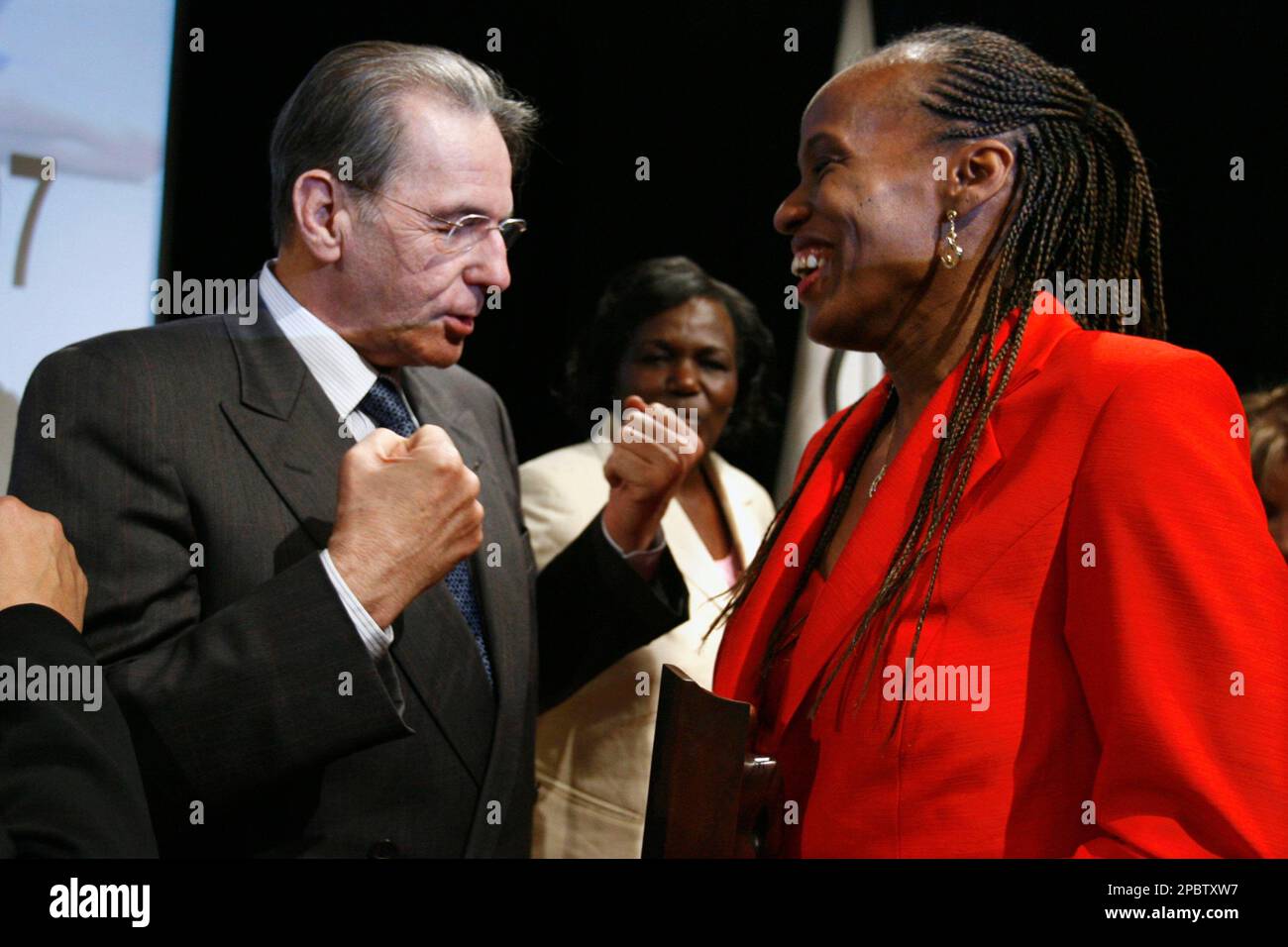 Olympic Gold medalist US's Jackie Joyner-Kersee, right, speaks with IOC ...