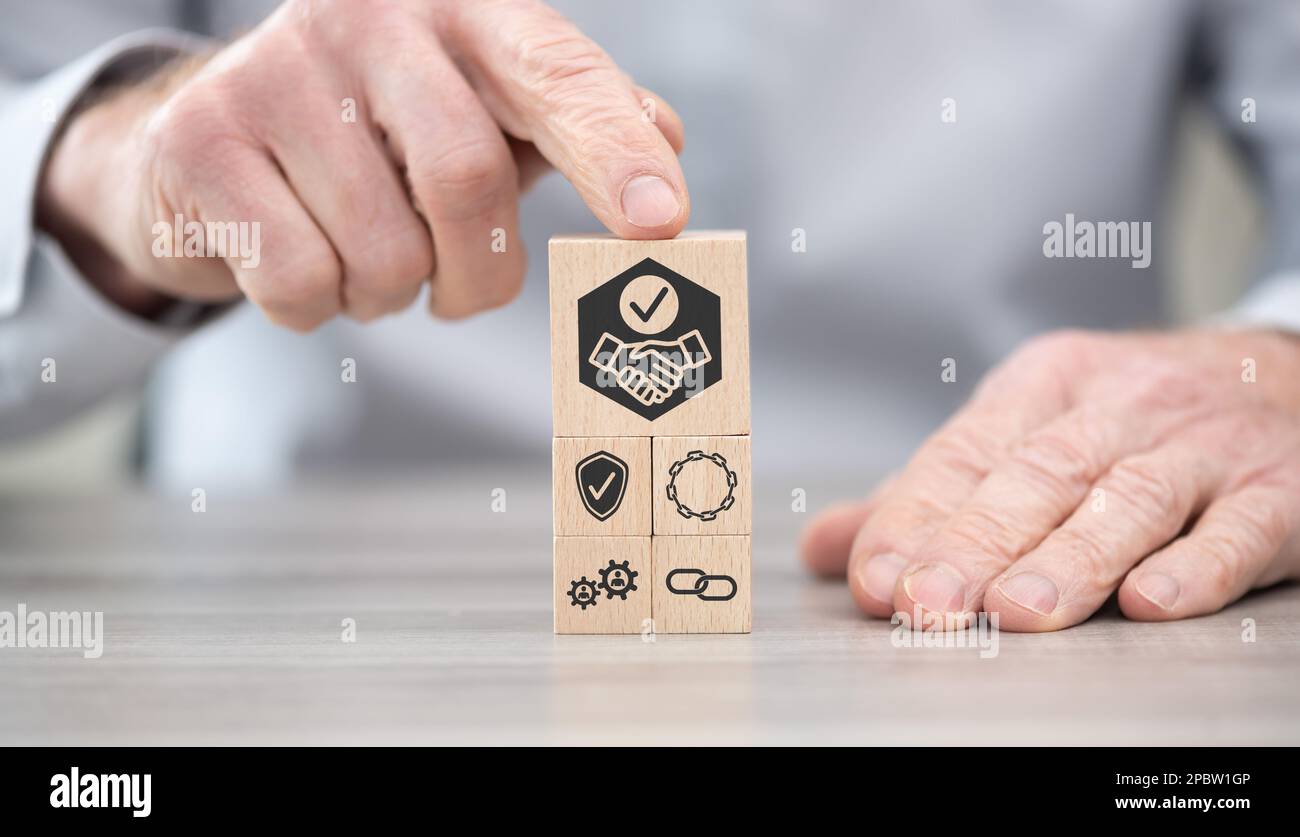 Wooden blocks with symbol of trust concept Stock Photo - Alamy
