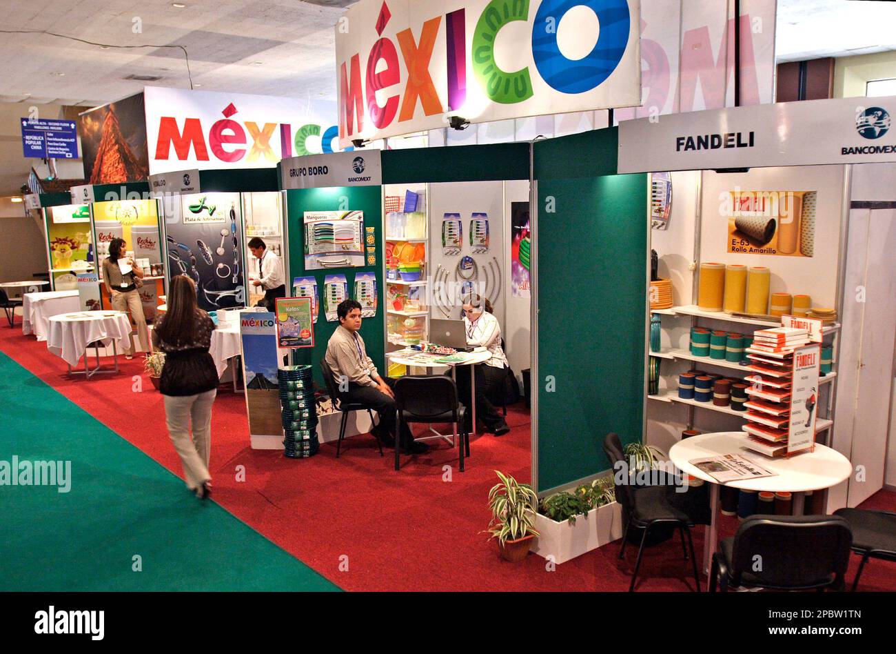Mexican traders wait for visitors during Expocomer 2007 international ...