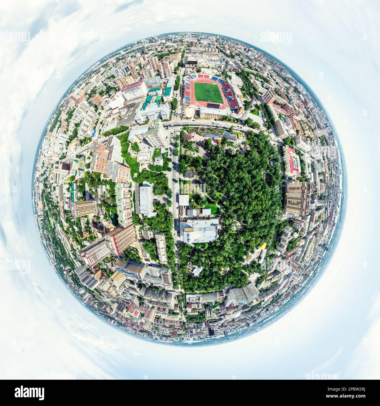 Aerial city view with crossroads and roads, houses, buildings, parks ...
