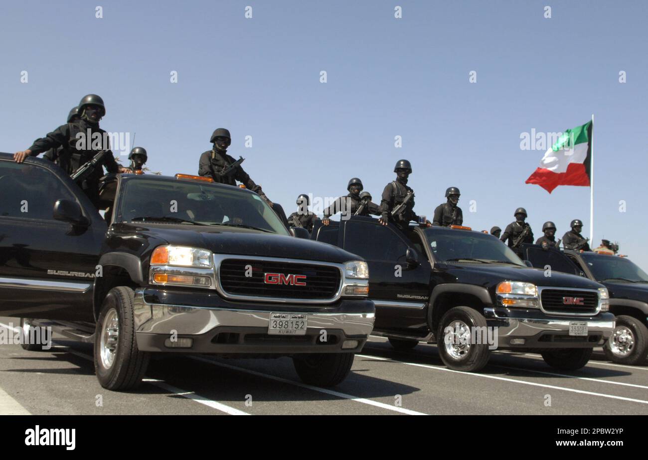 Members of Kuwait's State Security Forces parade through the Subhan ...