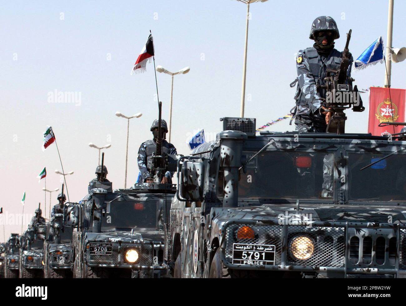 Members of Kuwait's Special Forces parade through Kuwait City ...