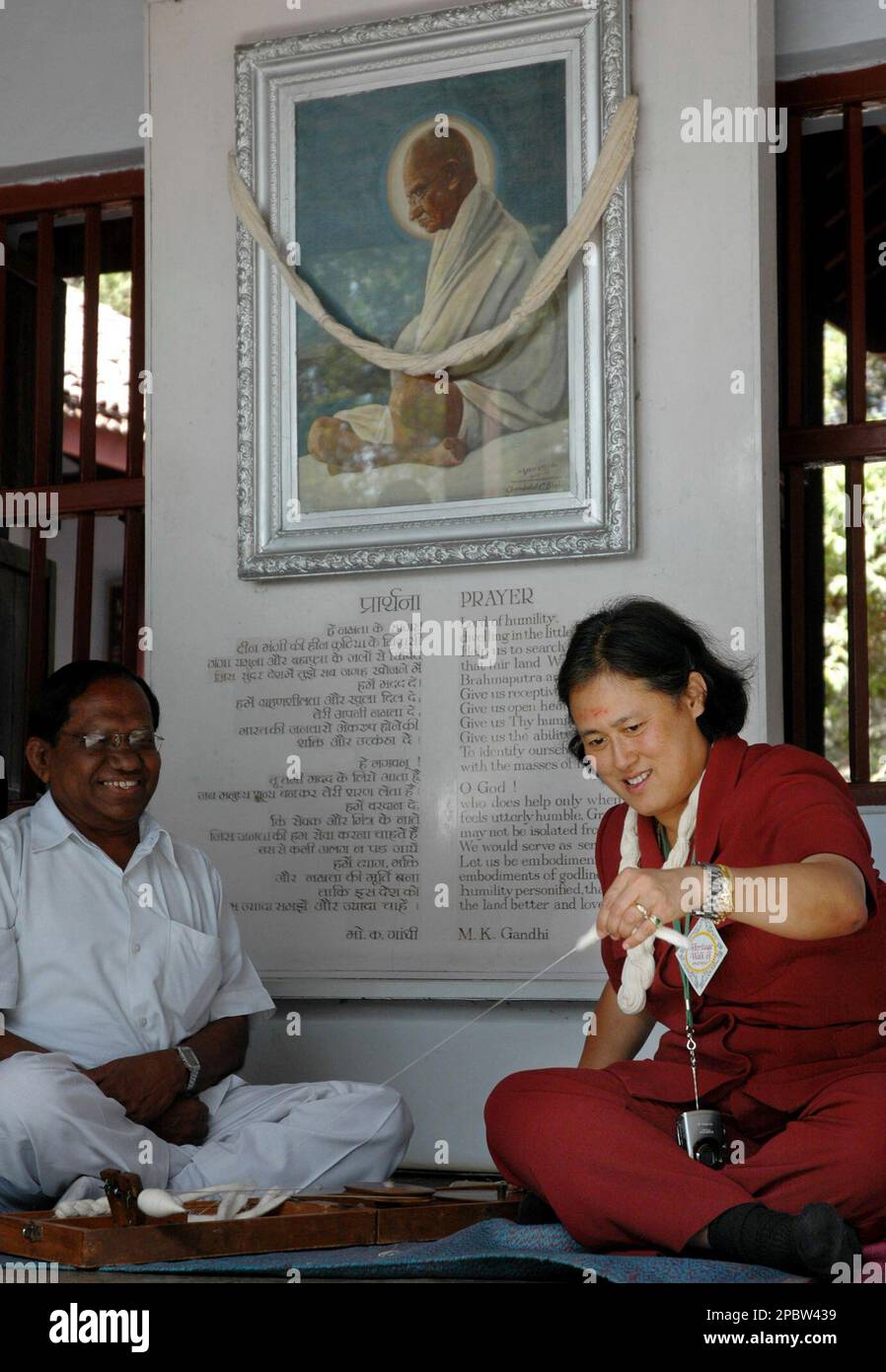 Thailand's Crown Princess Maha Chakri Sirindhorn, right, tries her hand ...