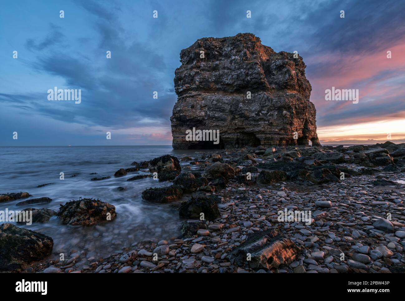 Dramatic dawn seascape of Marsden rock in North East England Stock ...