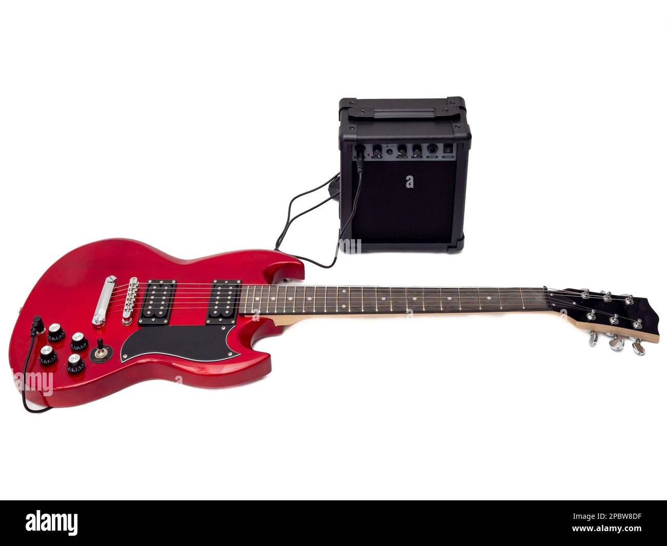 Red electric guitar and classic amplifier. Musical instrument guitar ...