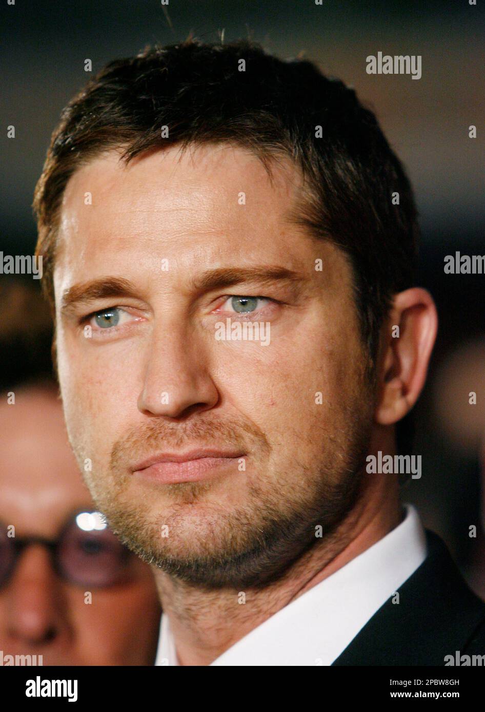 Gerard Butler arrives at the premiere of "300" in Los Angeles, Monday ...