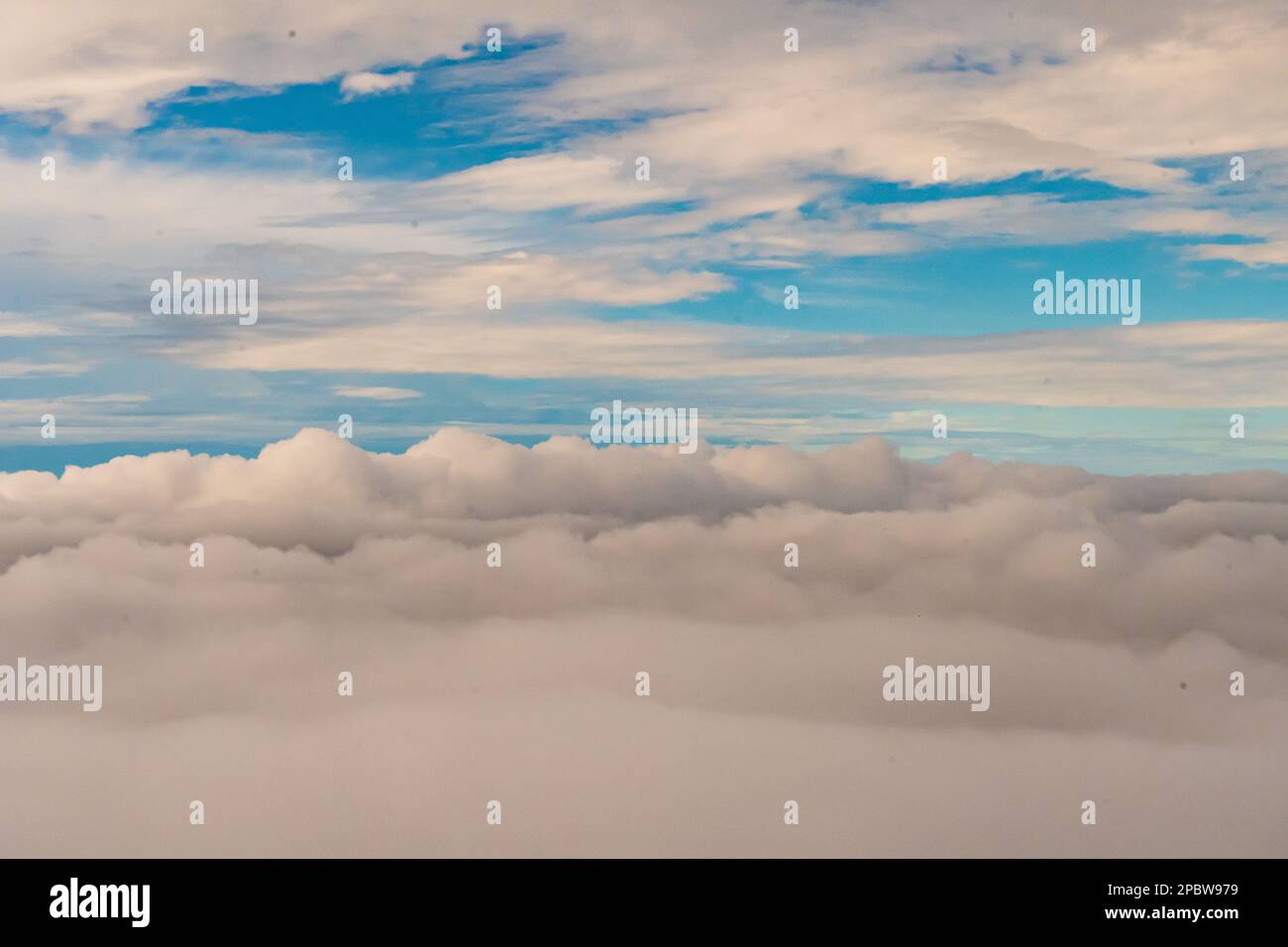 Aerial view of clouds out of my airplane window Stock Photo - Alamy