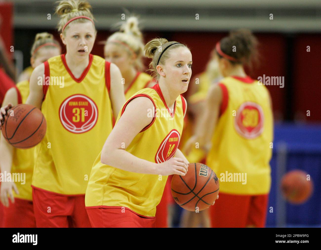Iowa guard Lyndsey Medders, right, and guard Megan Ronhovde, left ...