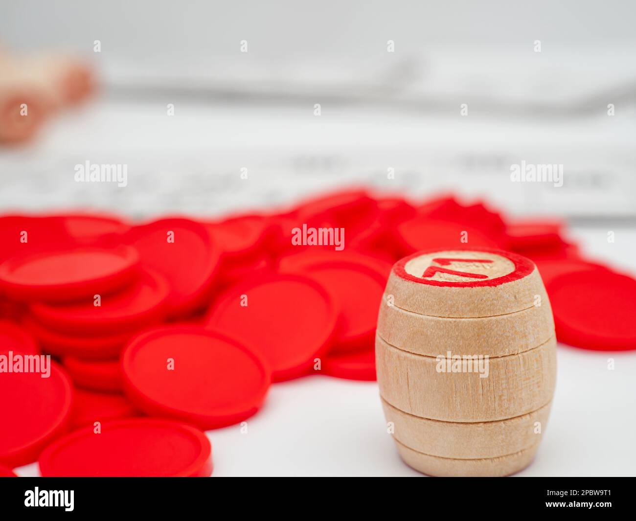 Board game bingo. Wooden barrels with lotto numbers, playing cards for ...