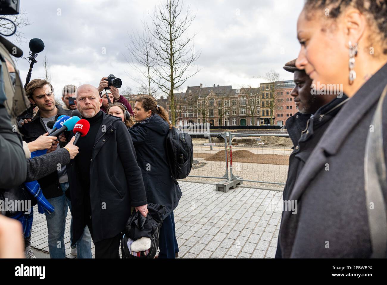 Lawyer Sven Mary and Sanda's father Ousmane Dia and his partner arrive ...