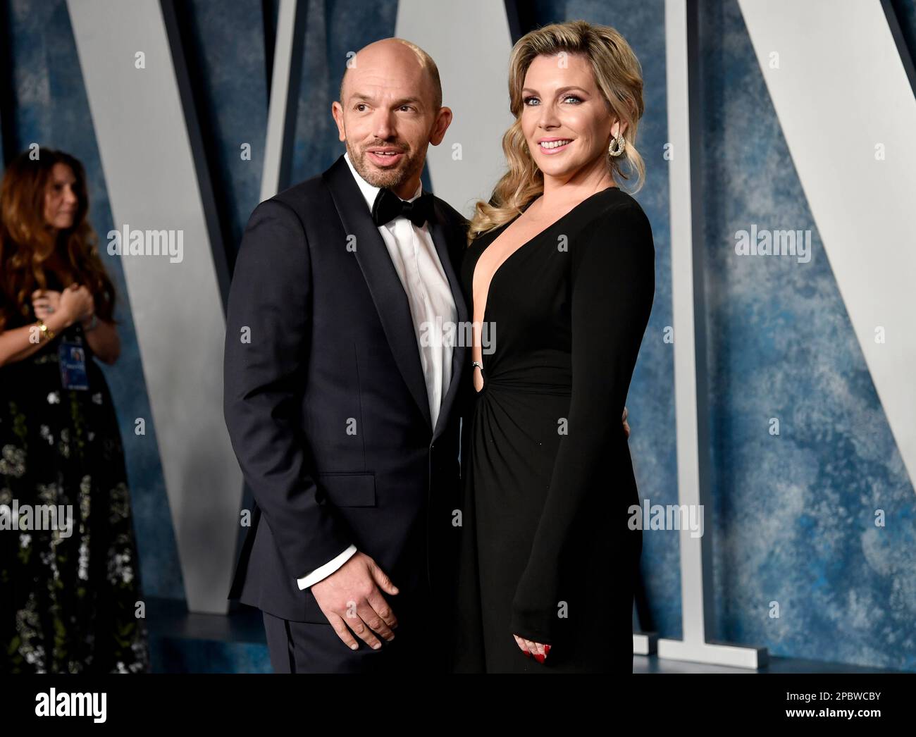 Paul Scheer, left, and June Diane Raphael arrive at the Vanity Fair ...