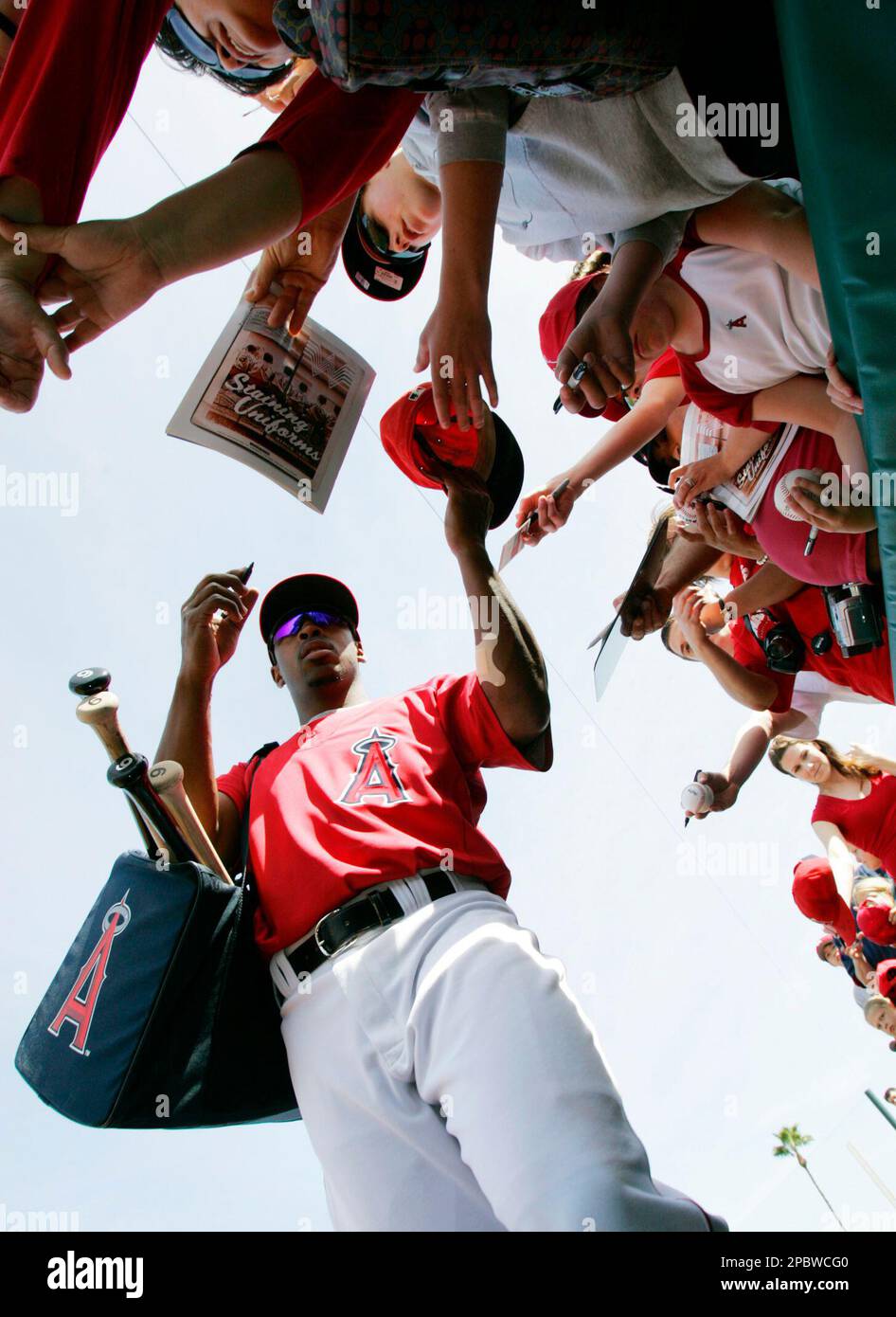 Los Angeles Angels third baseman Chone Figgins signs autographs prior ...